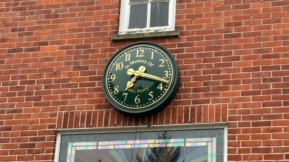 Ruth Perry: Playground clock mounted as tribute to head - BBC News