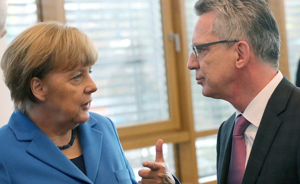 Migrants Crisis Merkel Backs De Maiziere In Refugee Row Bbc News