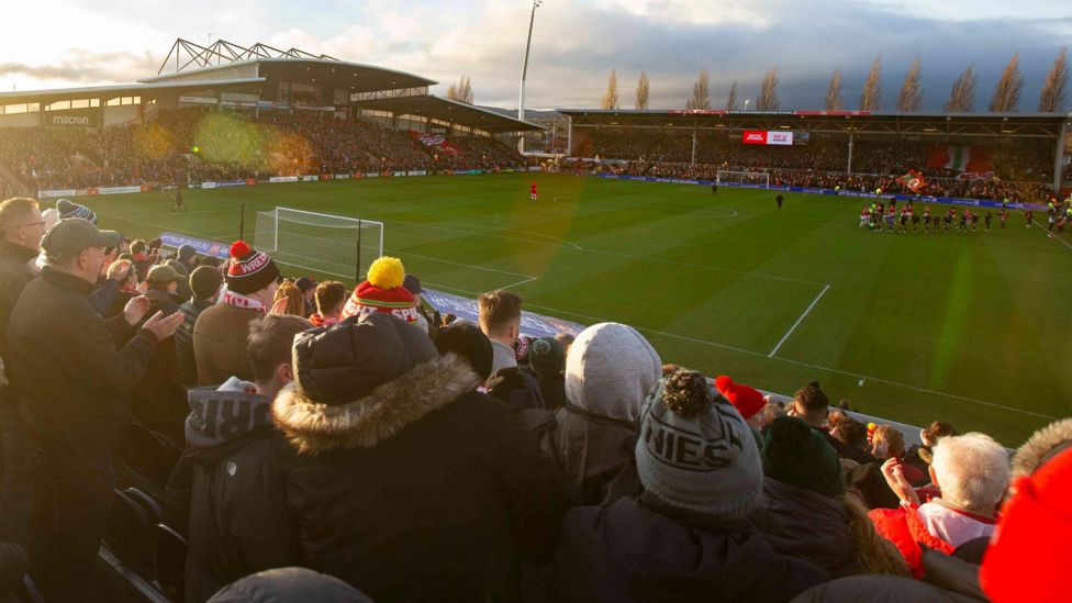 Wrexham to expand temporary stand after 'reassessing' stadium plans ...