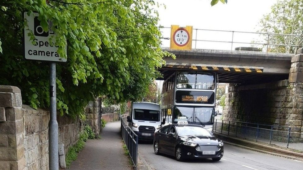School bus gets stuck under low bridge again - BBC News