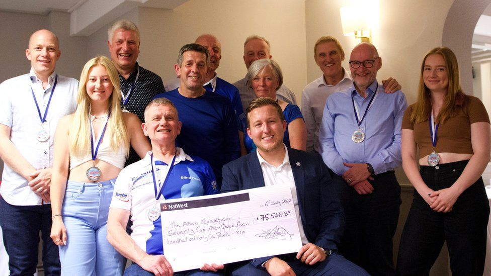 'Blind Dave' Heeley raises £75k on Colditz cycle challenge - BBC News