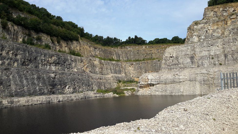 Mold quarry pool dyed to deter children from swimming - BBC News