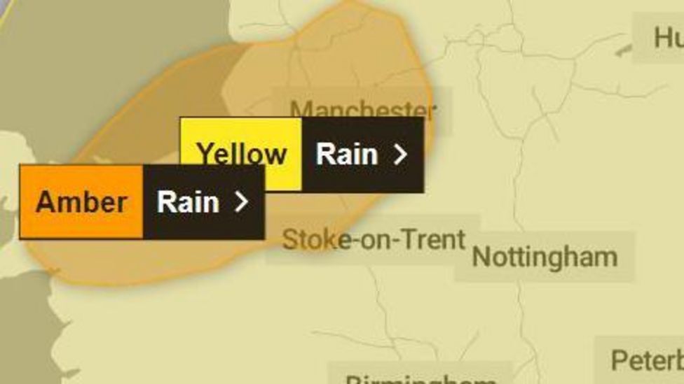 North West weather: Risk of flooding as amber warning issued - BBC News