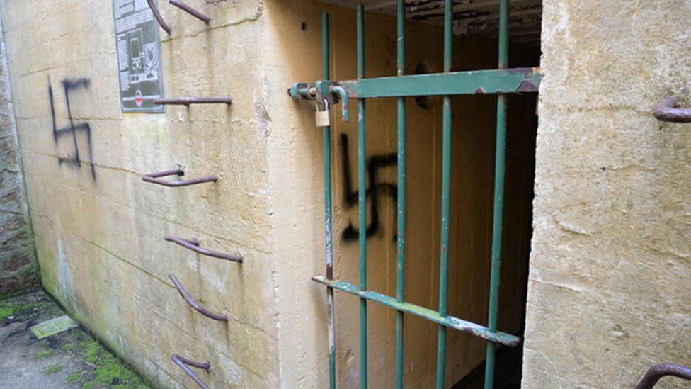 Jersey World War Two bunkers painted with Nazi symbols - BBC News