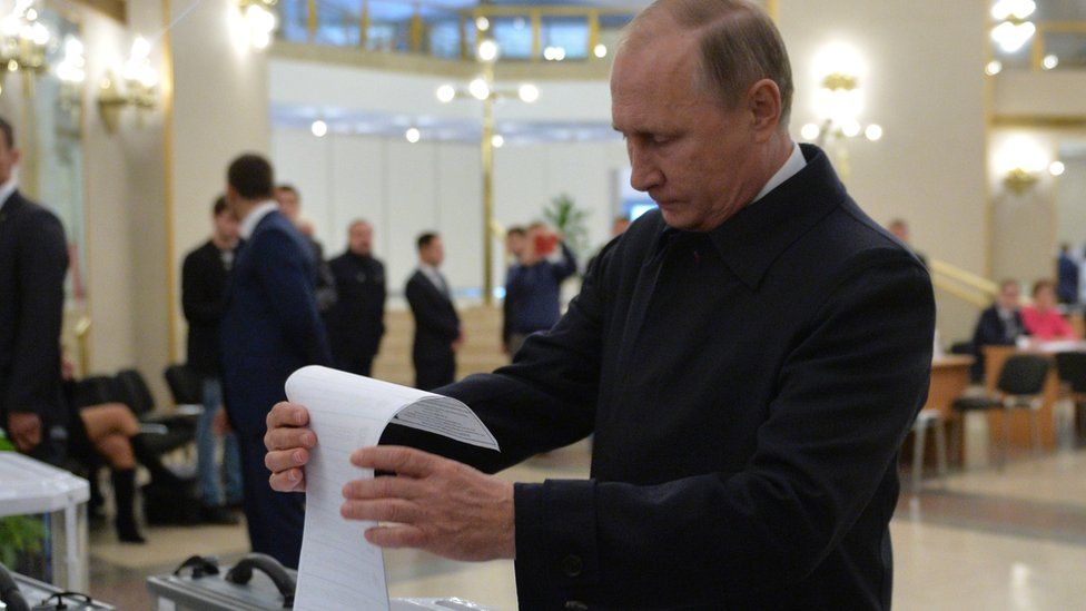 Russia votes in parliamentary election with firm Putin grip - BBC News