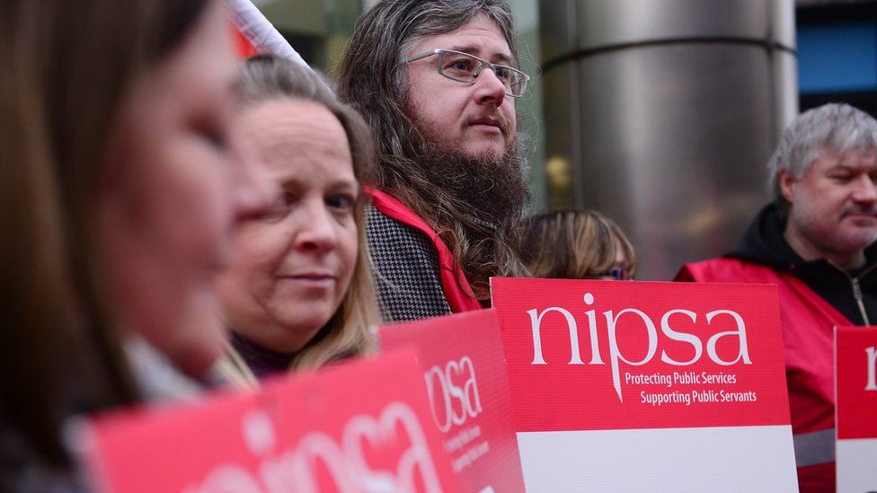 NI civil servant pay award implemented despite strike - BBC News