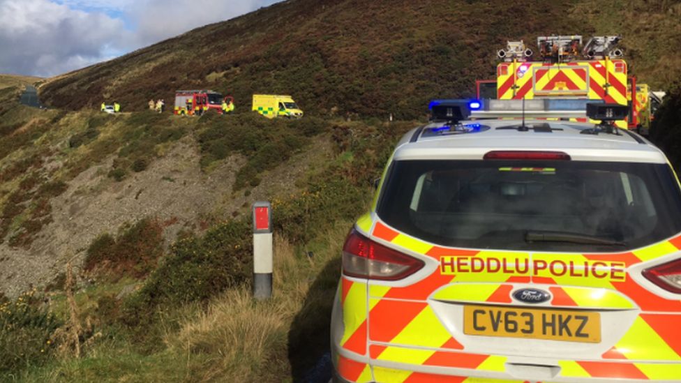 Van plunges 200m down mountainside after lorry crash - BBC News