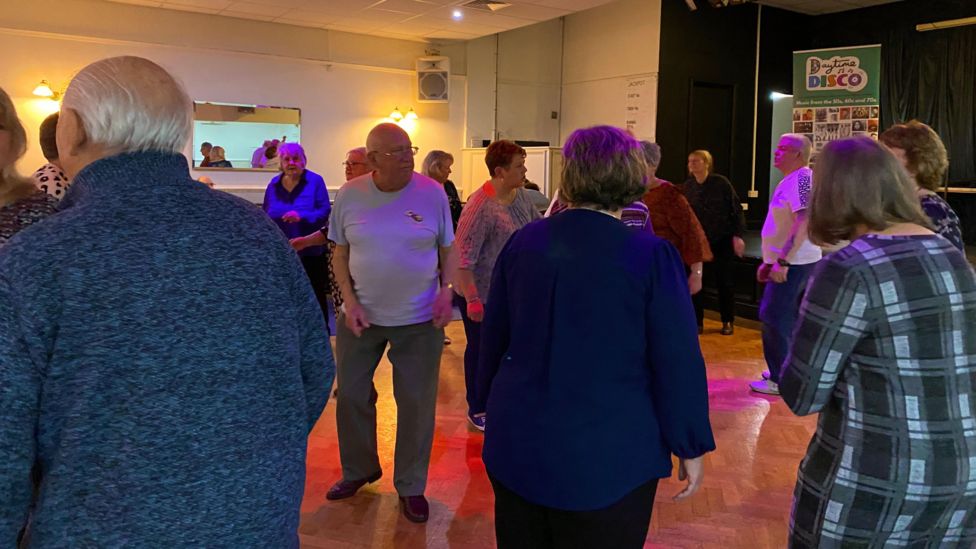Age UK Wolverhampton's daytime disco unites people on dancefloor - BBC News
