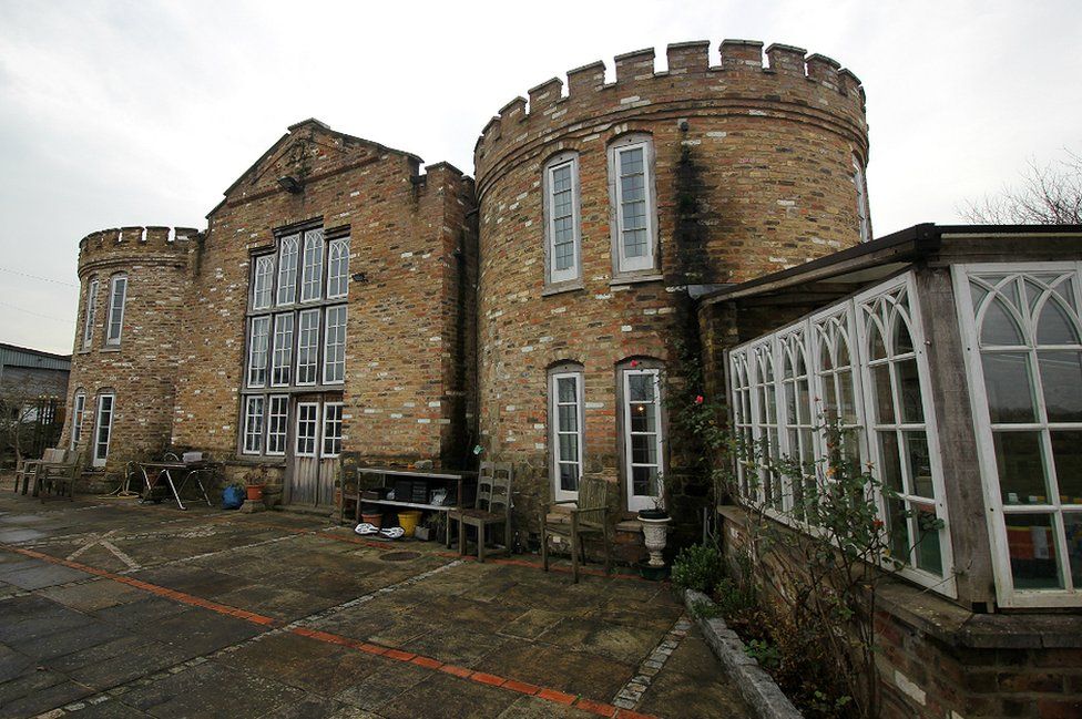 Surrey farmer starts 'hidden castle' demolition - BBC News
