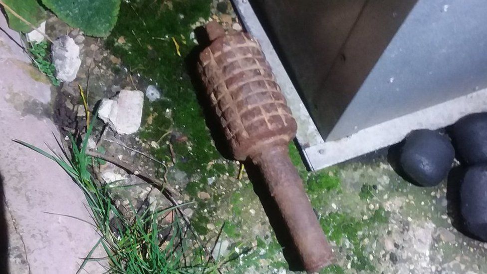 Live WW1 bomb kept above fireplace in Norfolk - BBC News
