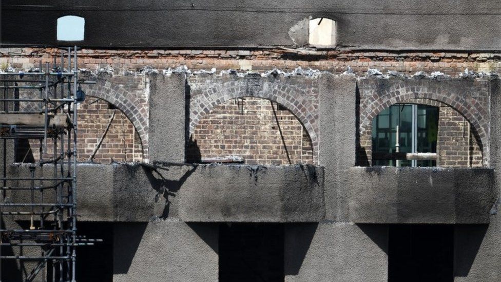 Residents displaced by school of art fire stage protest - BBC News