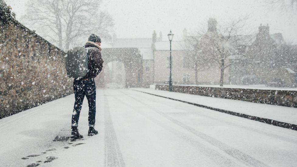 Shards of 'sea-ice' wash up along Sefton beach - BBC News