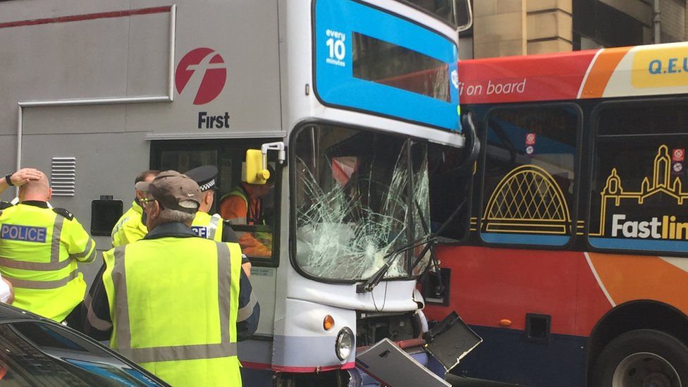 Driver suspended after 'runaway' bus crash in Glasgow - BBC News