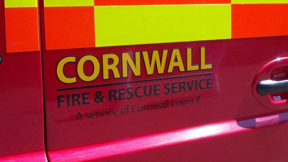 St Austell fire: Resident rescued from burning flat - BBC News