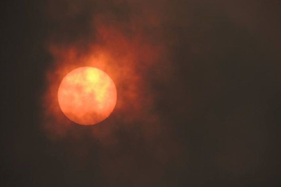 Red sun phenomenon 'caused by Saharan dust', analysis shows - BBC News