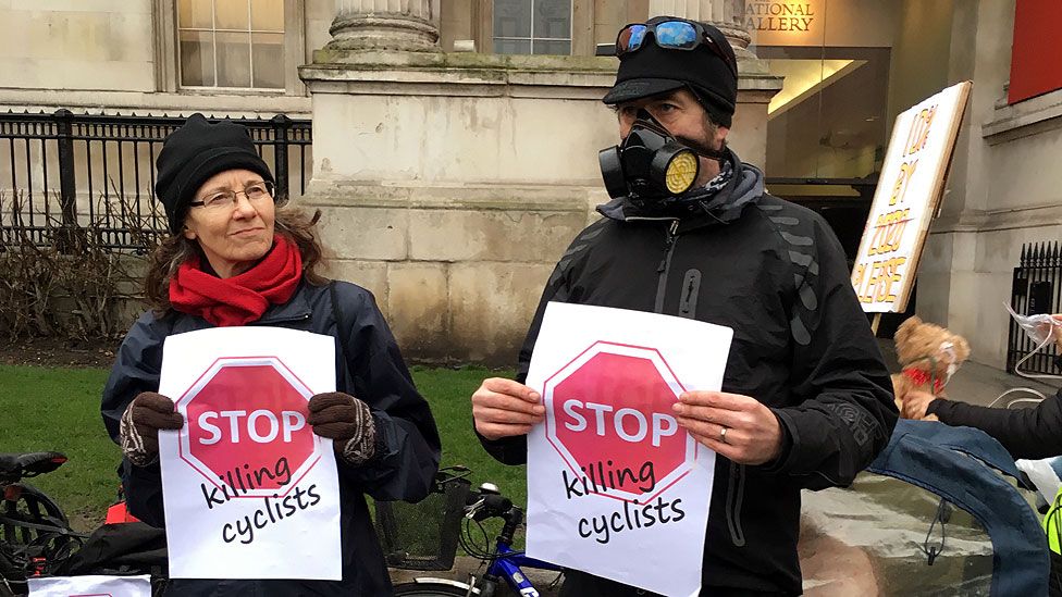 Cyclists stage 'die-in' protest in London for safer roads - BBC News
