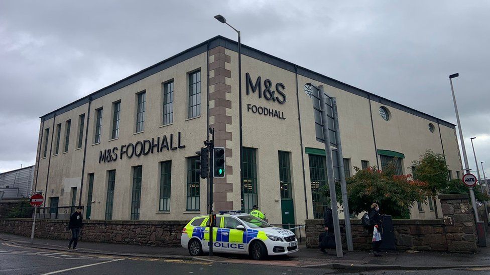 Man charged with attempted murder over Dundee M&S bottle attack - BBC News