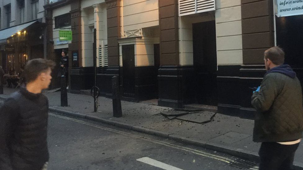 Exploding Soho pavement 'due to power fault' Met says - BBC News