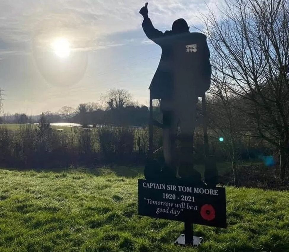 Woman sentenced for defacing Captain Sir Tom Moore memorial - BBC News