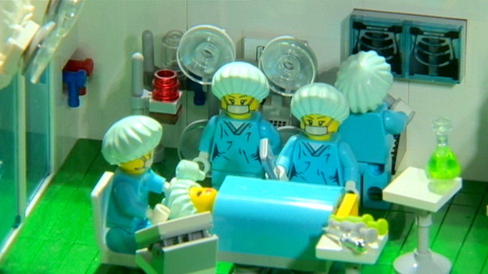 Lego super heroes exhibition on display in London - BBC News