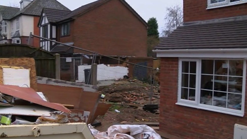 Wolverhampton gas blast neighbour still not home one year on - BBC News