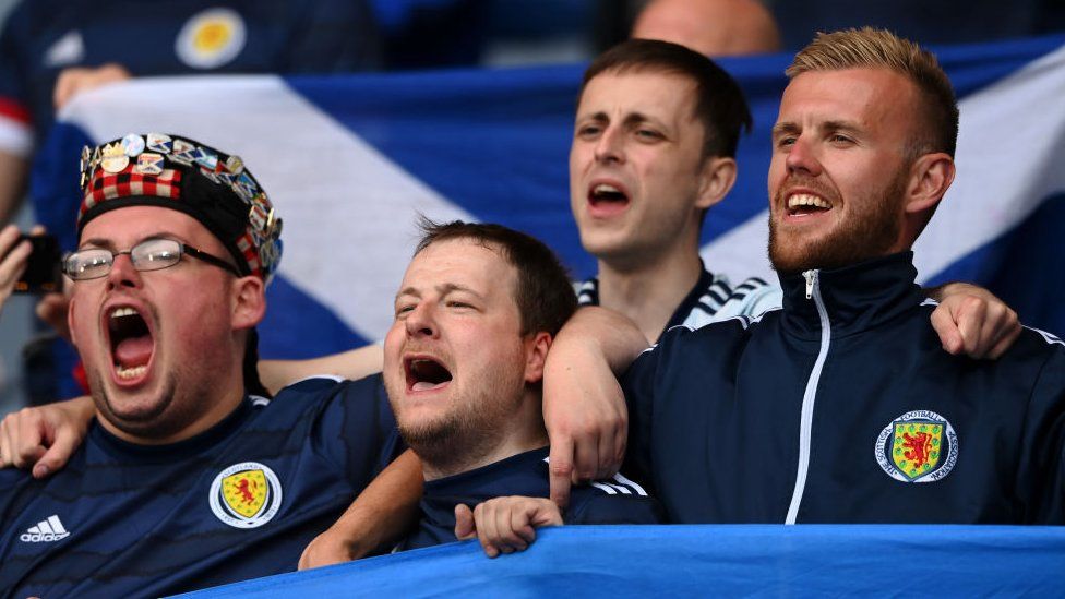 In pictures: Tartan Army's rollercoaster ride ends in heartache - BBC News