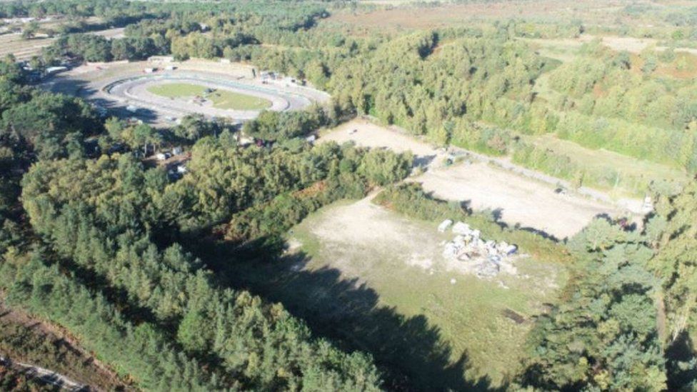 Matchams Stadium racetrack homes plan turned down - BBC News