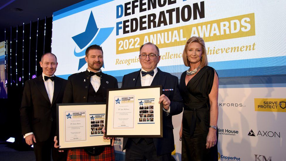 Two officers awarded for rescuing four people from loch - BBC News