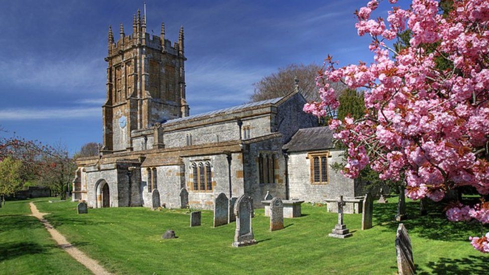 Charminster church holds first service since 2014 floods - BBC News
