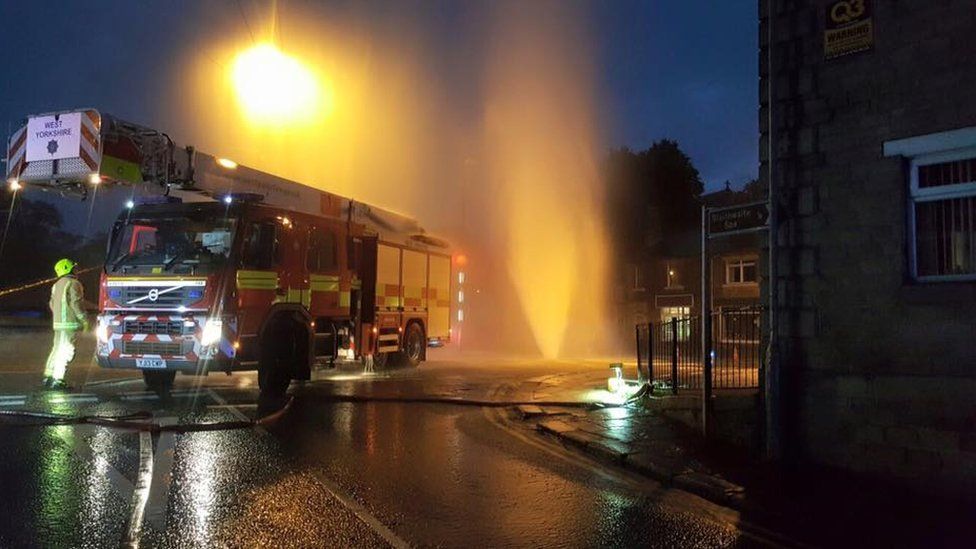Damaged fire hydrant causes 30ft water spout in village - BBC News