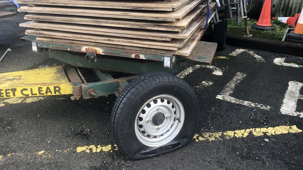 Tyre slashers target Buxton Market for third time - BBC News