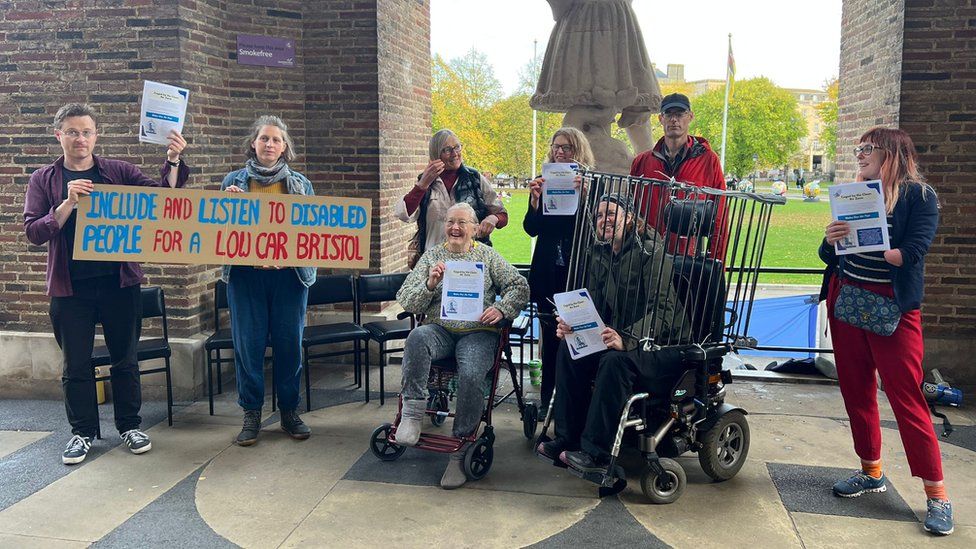 Disabled campaigners protest Clean Air Zone charges - BBC News