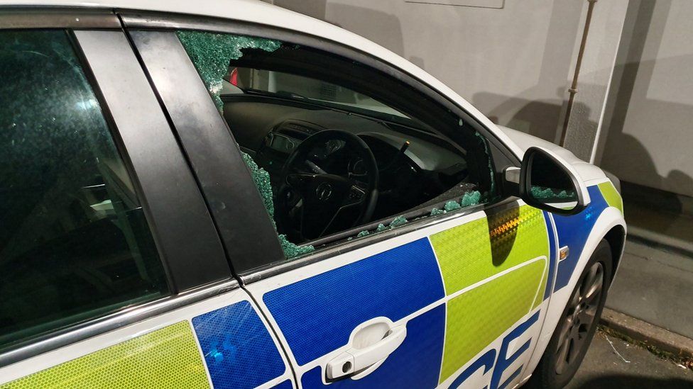 Officer injured after brick thrown at police car in Solihull - BBC News