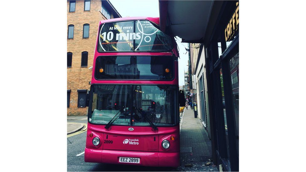 Translink bus damages coffee shop in Belfast city centre - BBC News