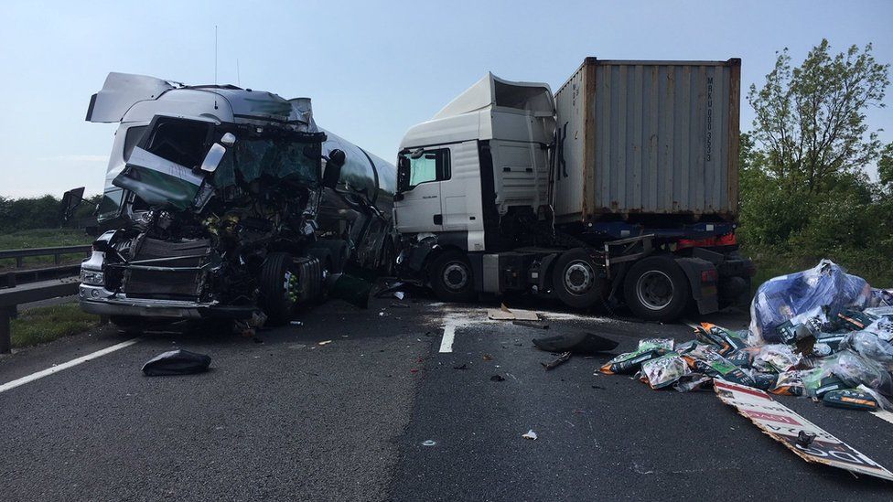 Dog food spilled over A14 near Godmanchester after lorry crash - BBC News