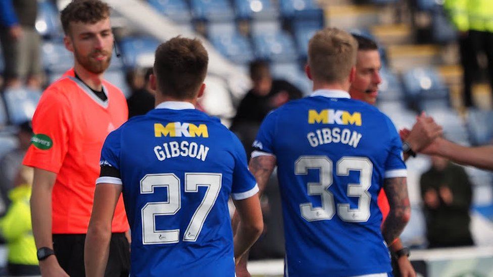 Father and son make football history at Queen of the South - BBC News