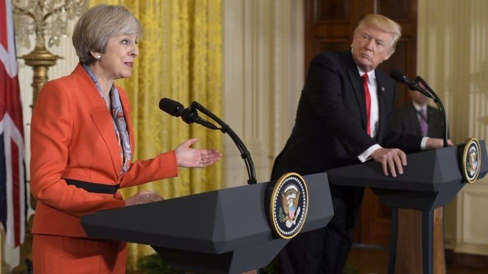 Newspaper headlines: May and Trump hand in hand dominates - BBC News