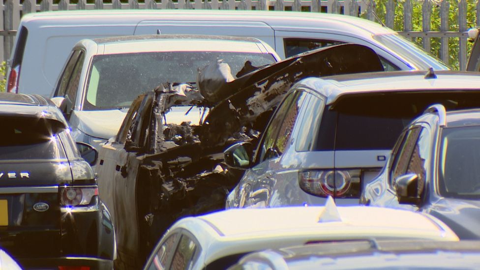 Luxury cars worth £850,000 damaged in Land Rover garage fire - BBC News