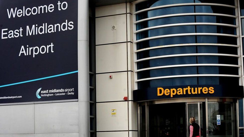 East Midlands Airport DHL workers announce 10-day strike over pay - BBC News