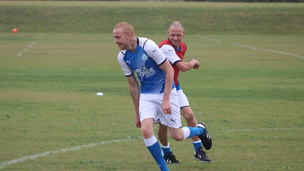 Peterborough charity 'empowering' the homeless with football - BBC News