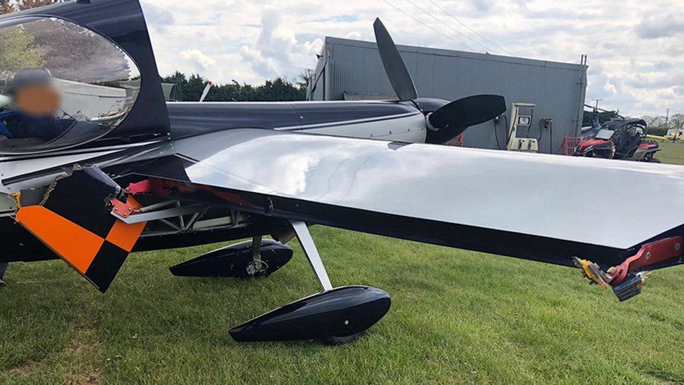 Pilot lands plane safely after part of wing falls off - BBC News