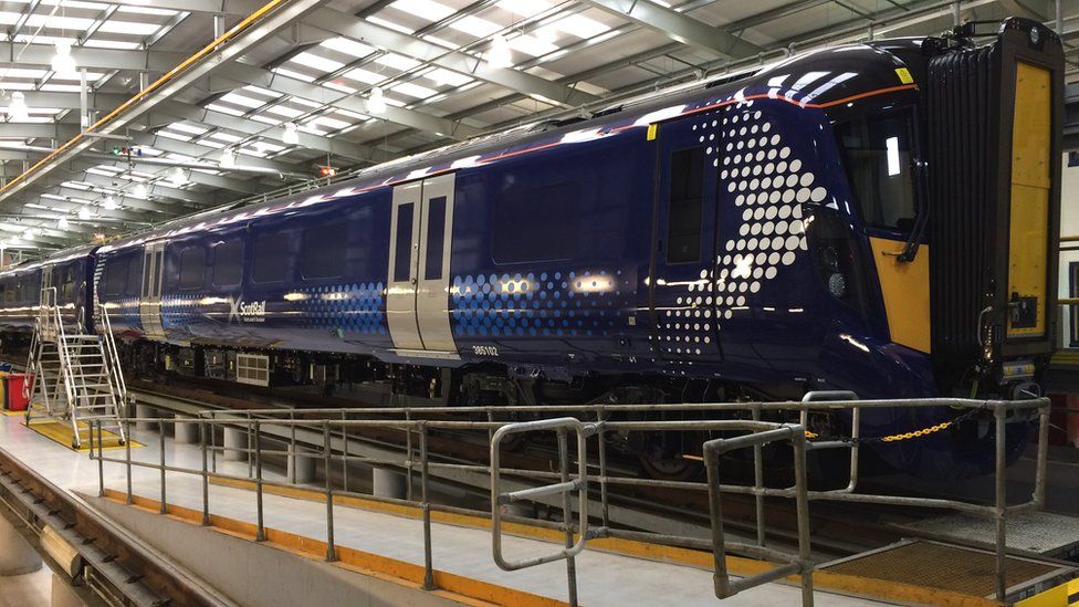 ScotRail electric train makes first short trip - BBC News