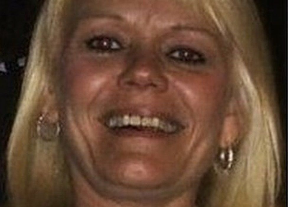 Janet Moore death: Surrey Police make murder arrest - BBC News
