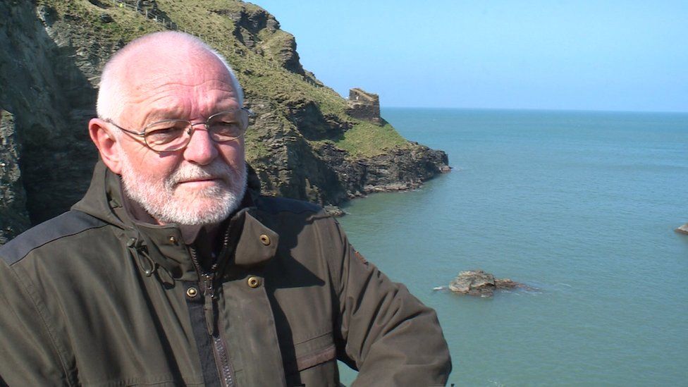 Tintagel Castle Merlin carving sparks 'Disneyfication' row - BBC News