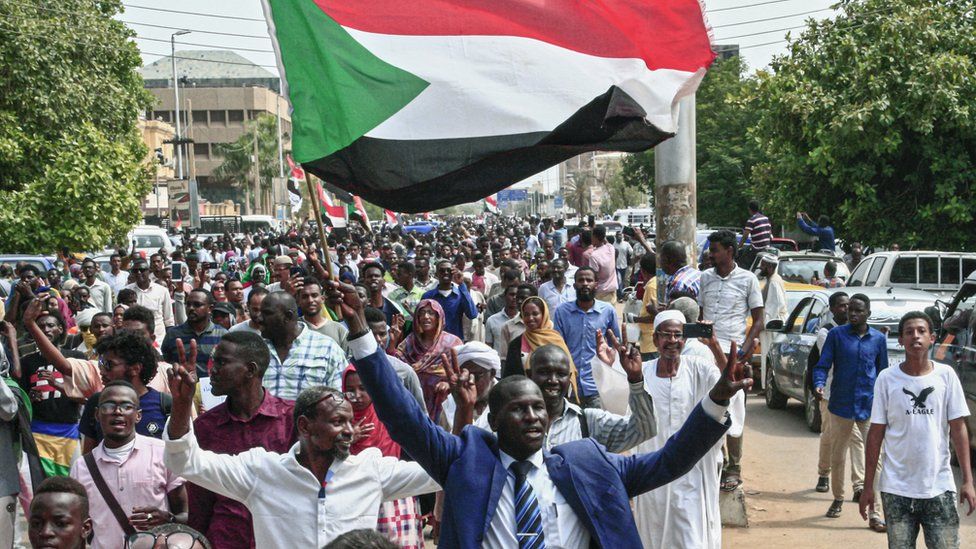 Sudan crisis: Thousands demand justice over protester killings - BBC News