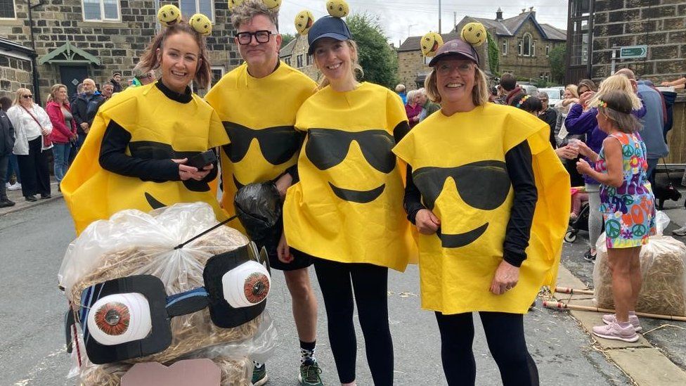 Oxenhope Straw Race: Pints and perspiration at annual bale race - BBC News