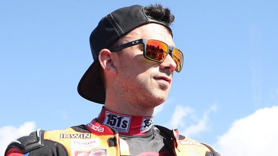 Mike Booth: Rider returns after second life-changing crash - BBC News