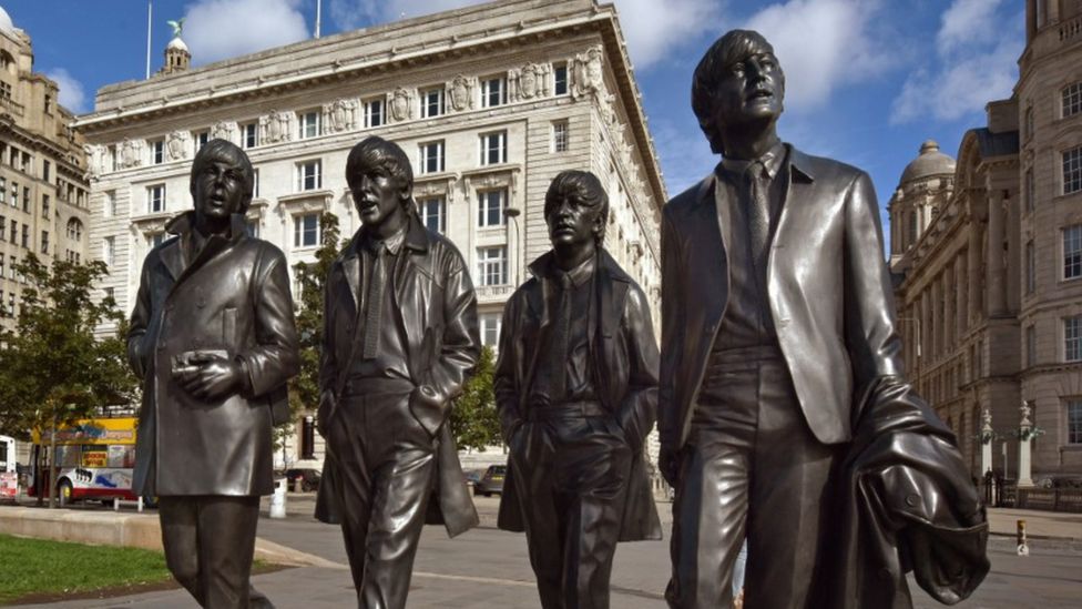 Brian Epstein: Statue of Beatles manager unveiled in Liverpool - BBC News
