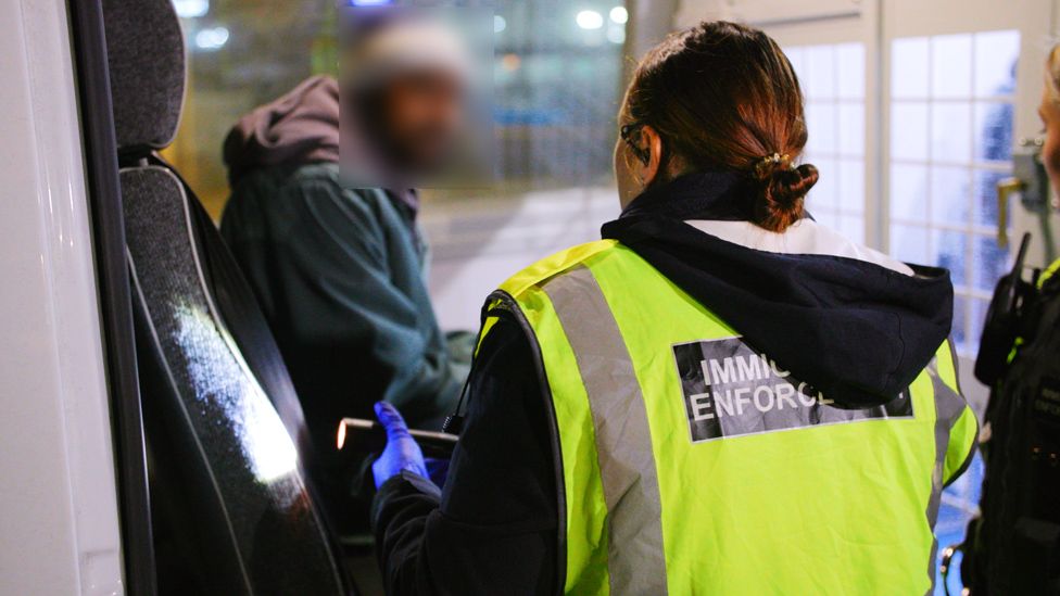 Two men arrested after immigration raid at Stockport abattoir - BBC News
