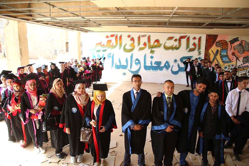 In pictures: Libyan students celebrate graduation amid ruins - BBC News